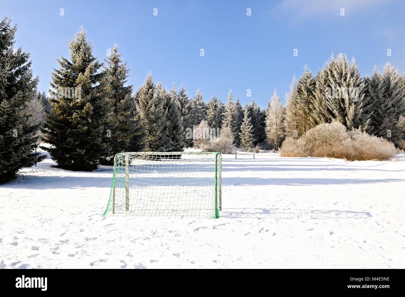 Snow on the football field Stock Photo - Alamy