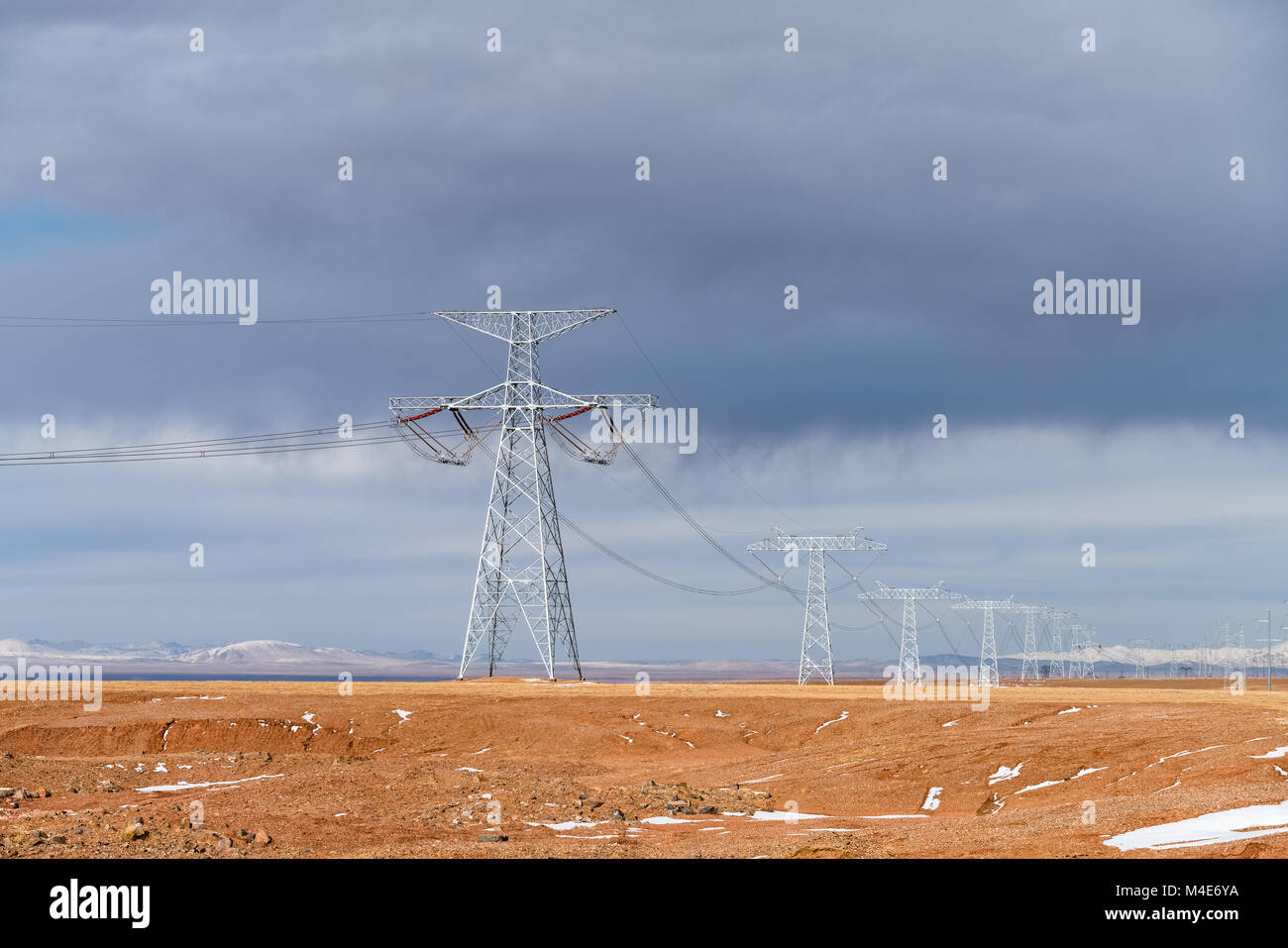 power transmission towers on plateau Stock Photo - Alamy