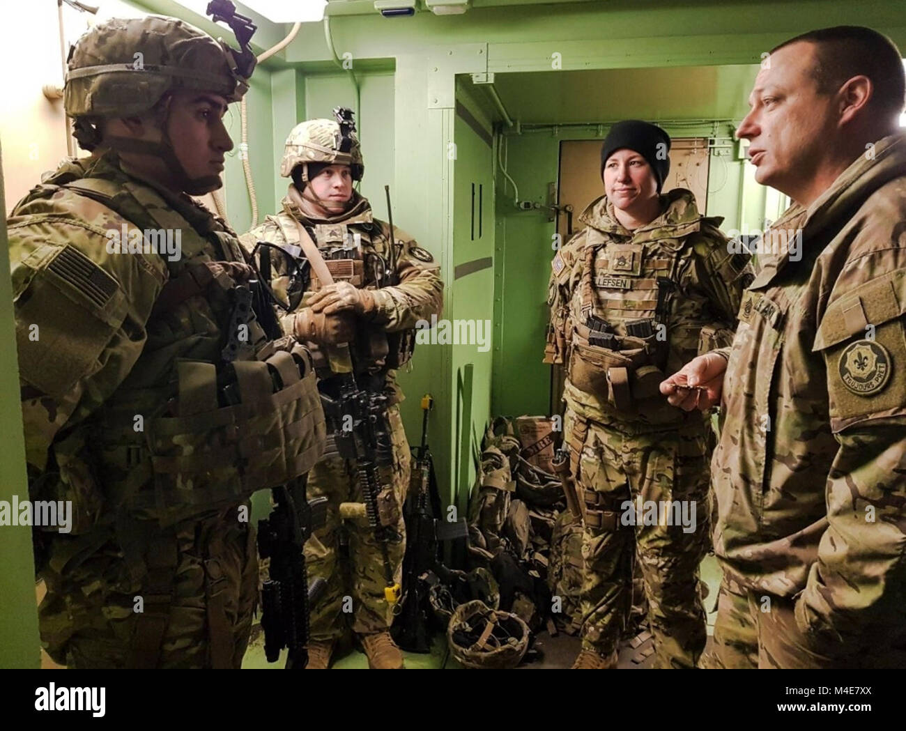 Pfc. Hunter Wood (left), military policeman assigned to the 287th MP ...