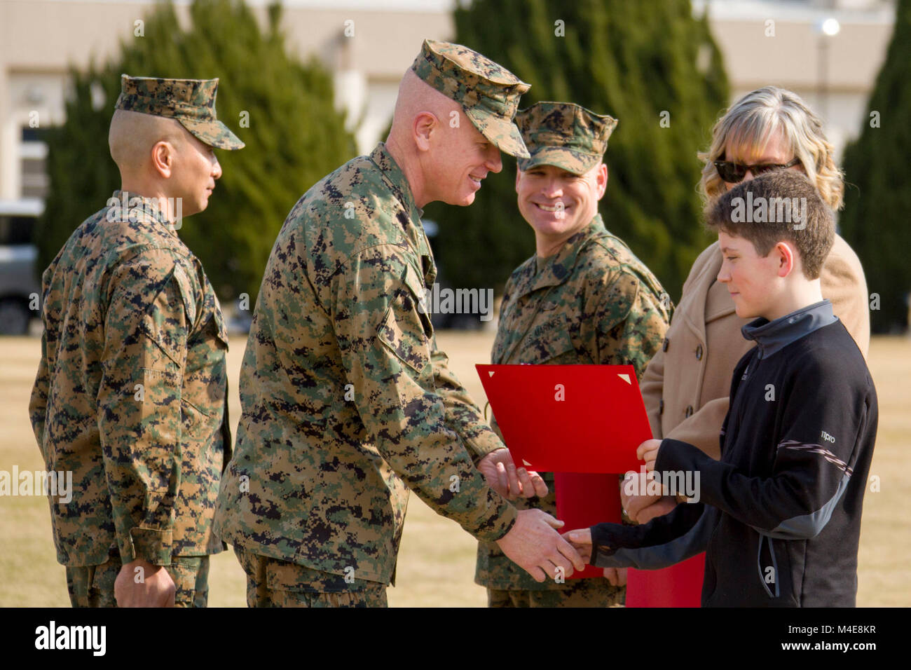 U.S. Marine Corps Brig. Gen. Paul Rock Jr., left, commanding general of ...