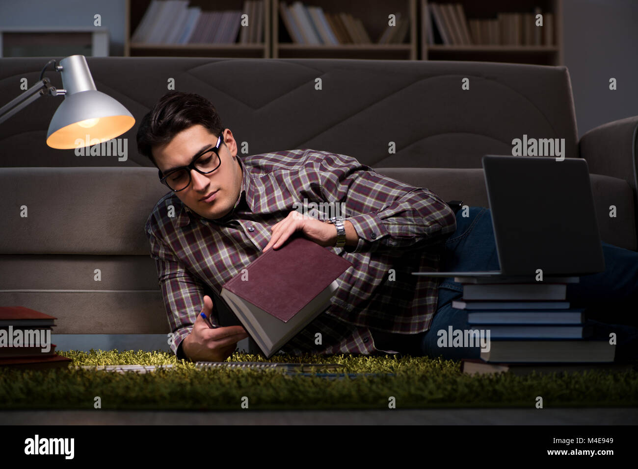 Student reading books preparing for exams Stock Photo - Alamy