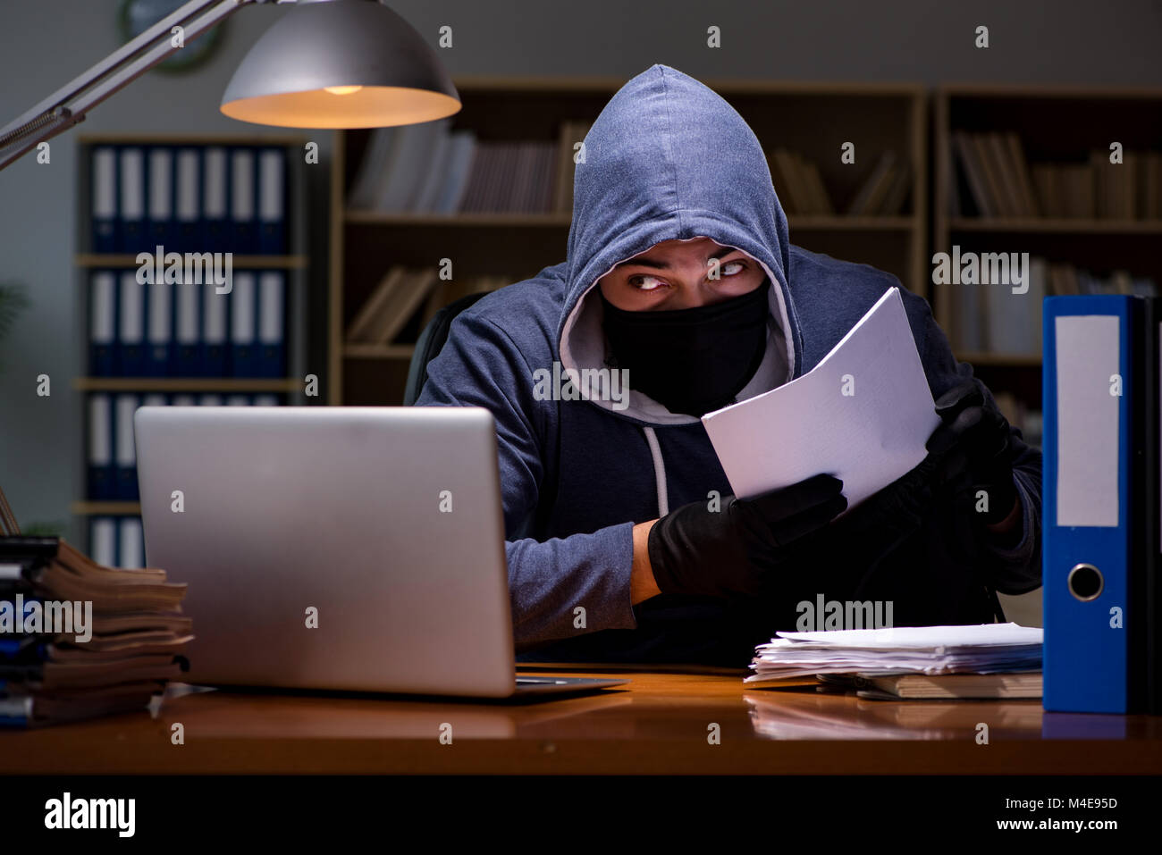 Hacker stealing personal data from home computer Stock Photo - Alamy