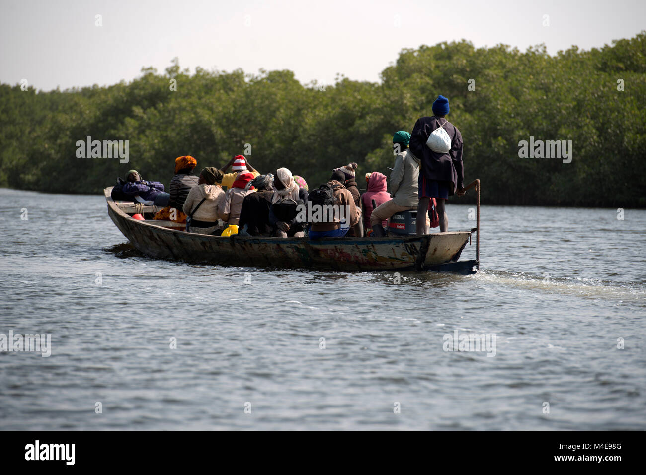 Ethnic indigenous Jola (Karon) passengers on a river boat in Senegal ...