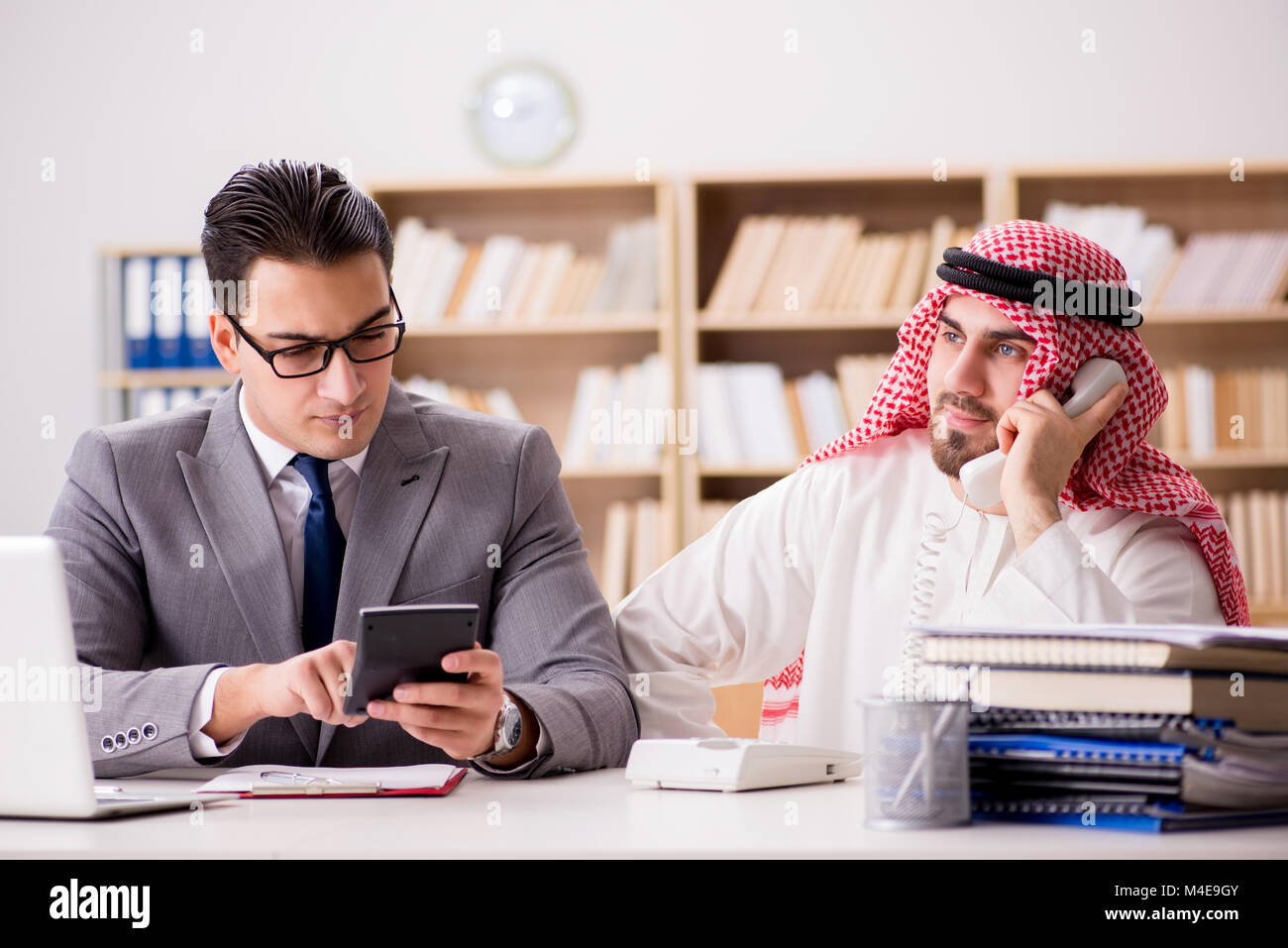Diverse business concept with arab businessman Stock Photo - Alamy
