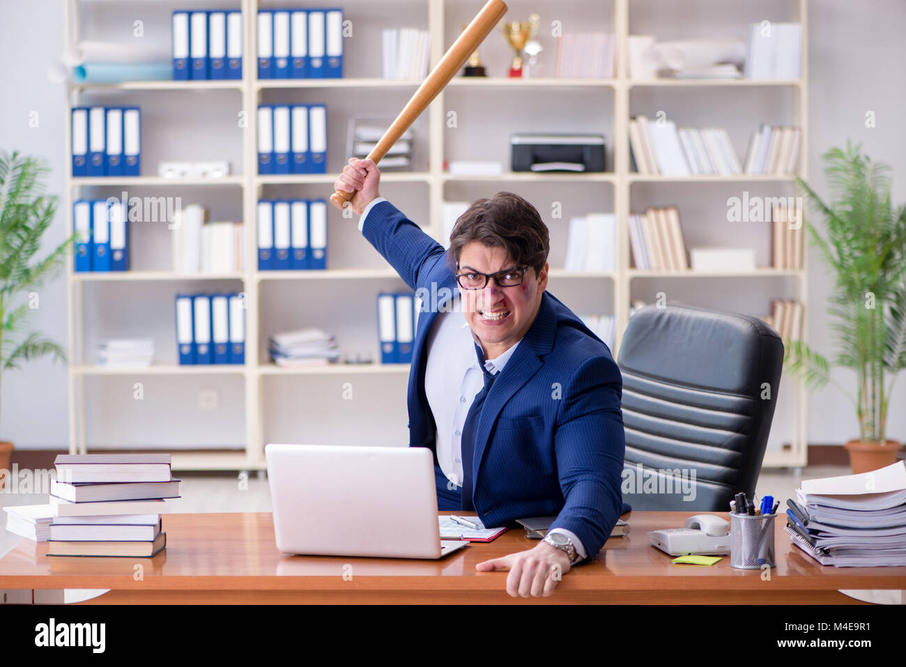 Angry aggressive businessman in the office Stock Photo - Alamy