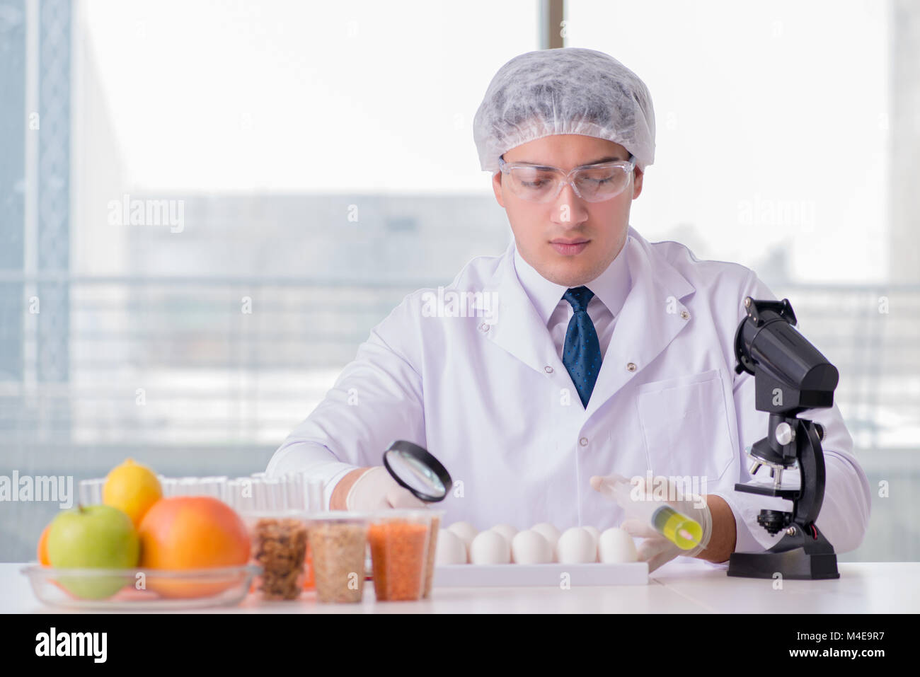 Nutrition expert testing food products in lab Stock Photo - Alamy