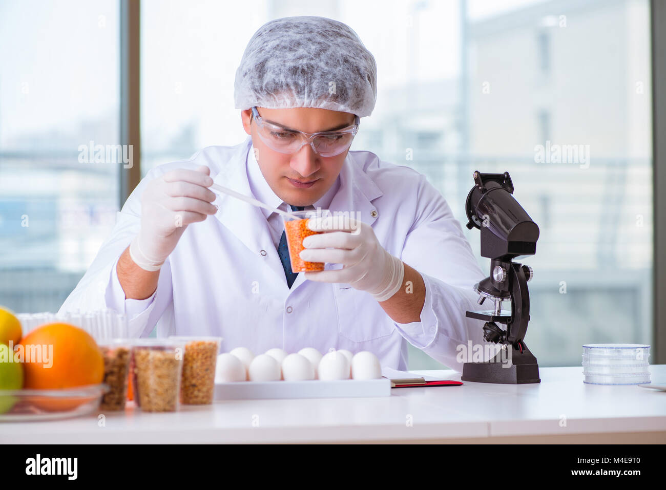 Nutrition expert testing food products in lab Stock Photo - Alamy
