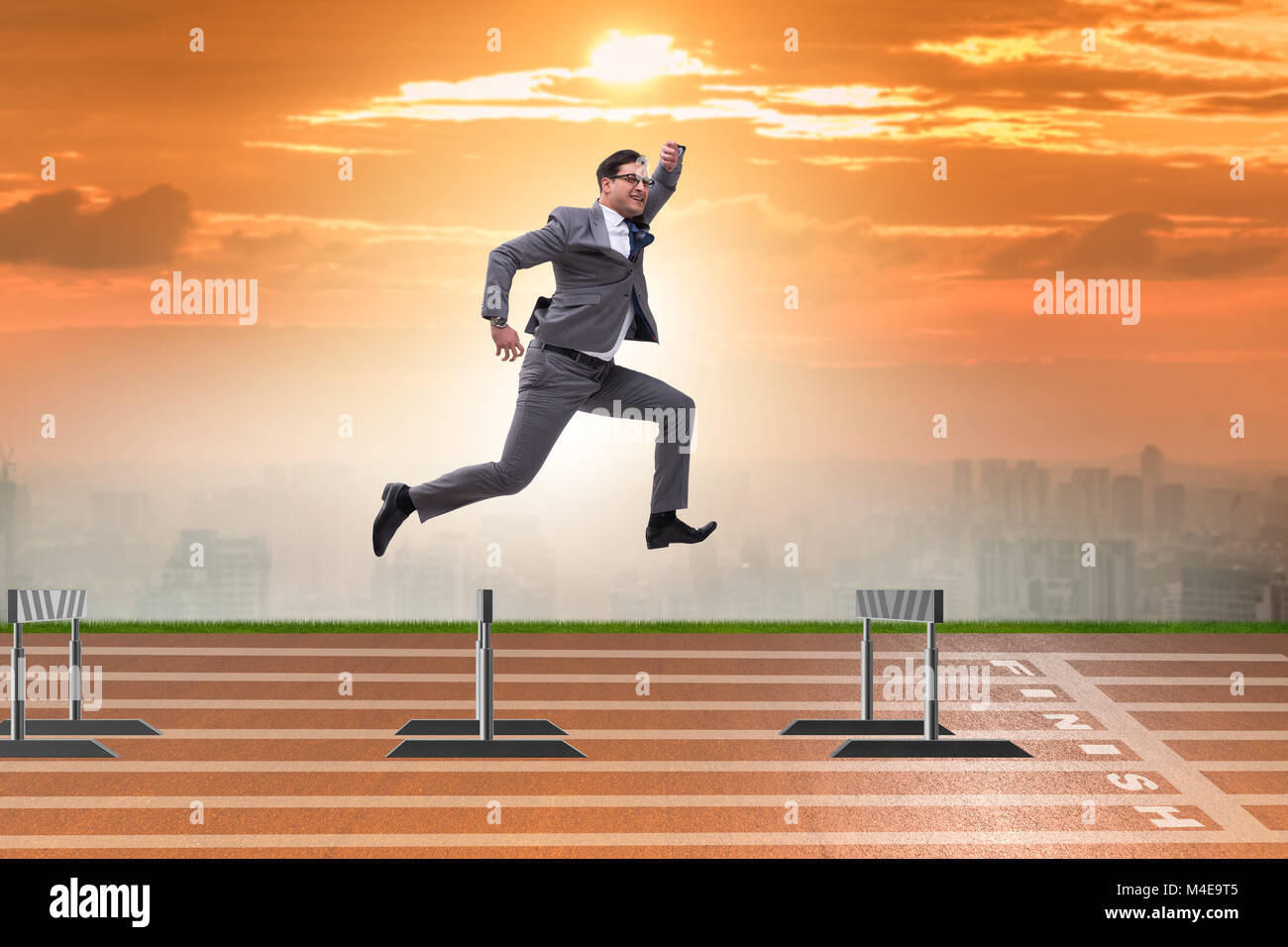 Businessman jumping over barriers hi-res stock photography and images ...