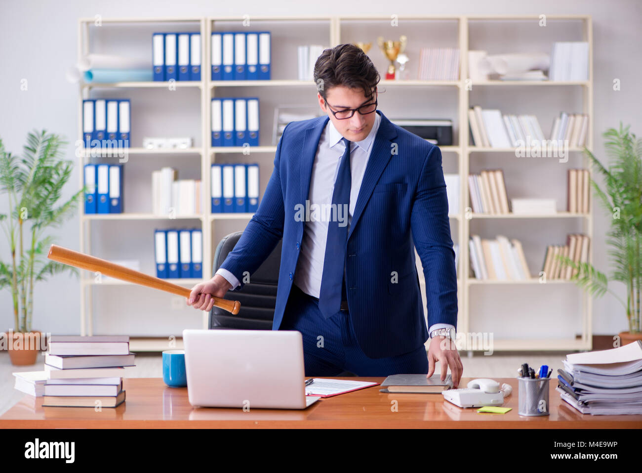 Angry aggressive businessman in the office Stock Photo - Alamy