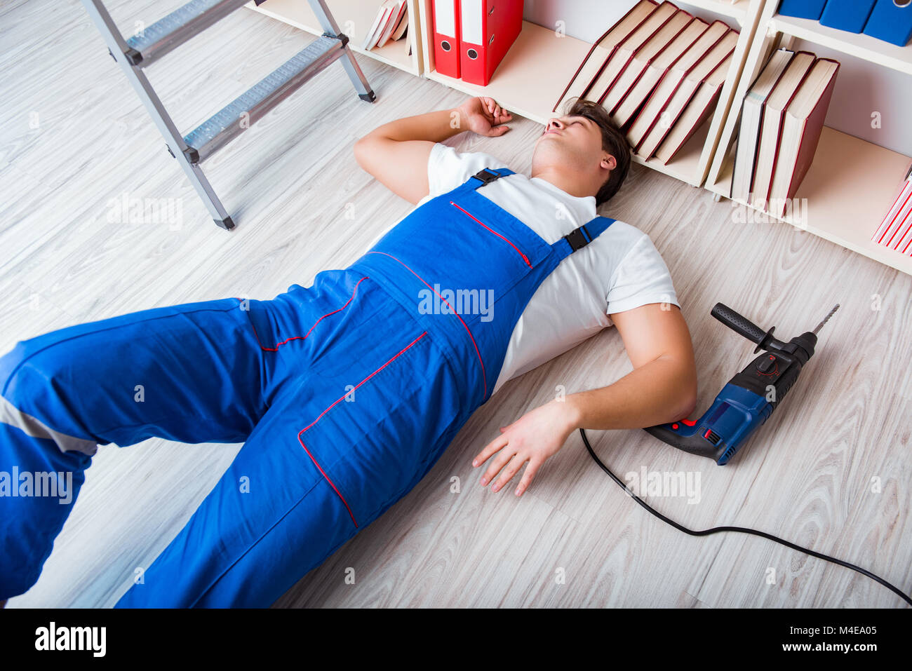 Unsafe behavior concept with falling worker Stock Photo - Alamy