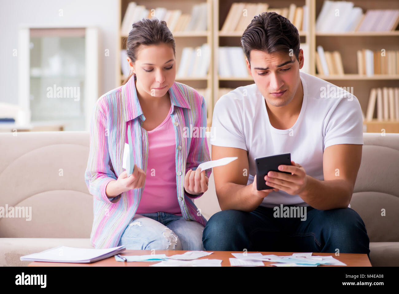 Young family discussing family finances Stock Photo - Alamy