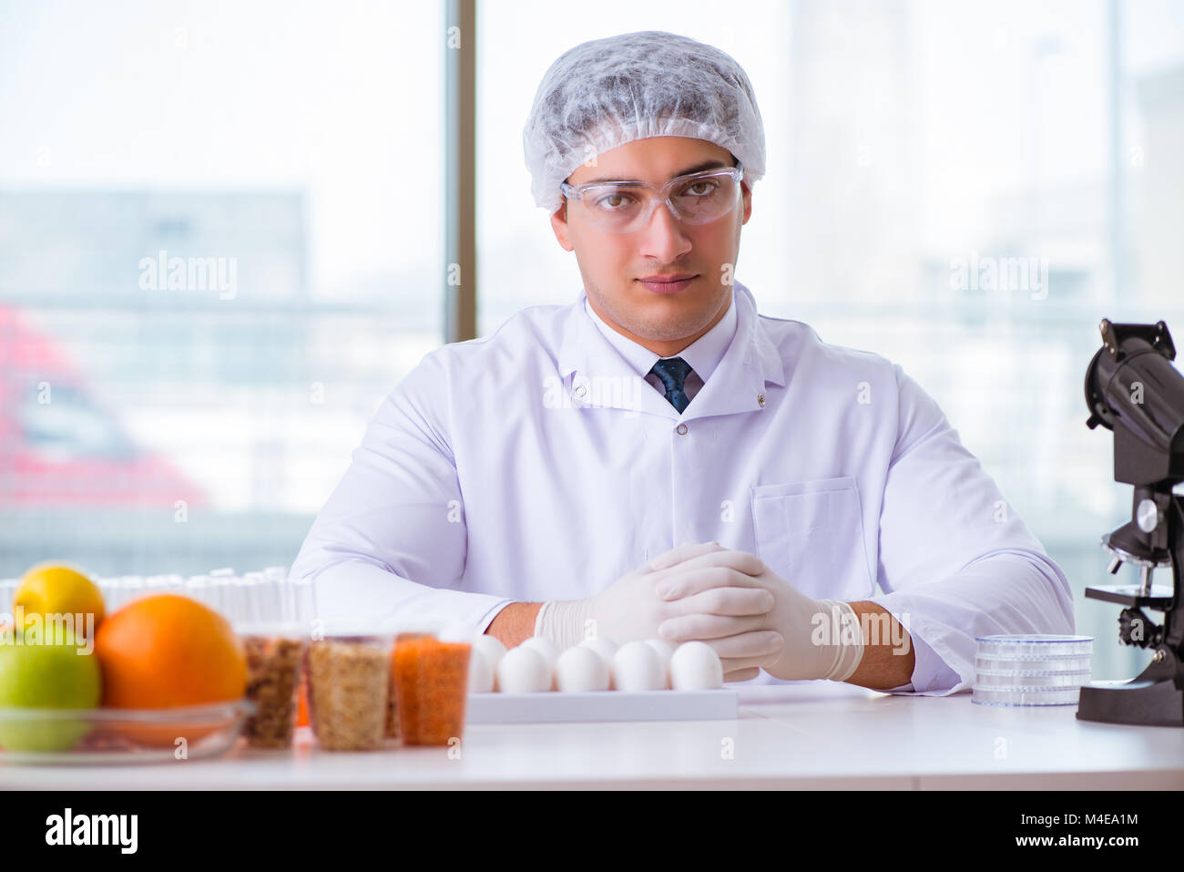Nutrition expert testing food products in lab Stock Photo - Alamy
