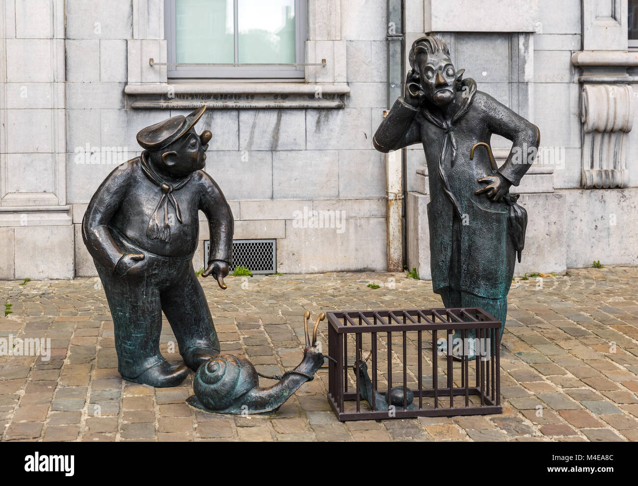 Funny statue in the street of Namur Belgium Stock Photo - Alamy