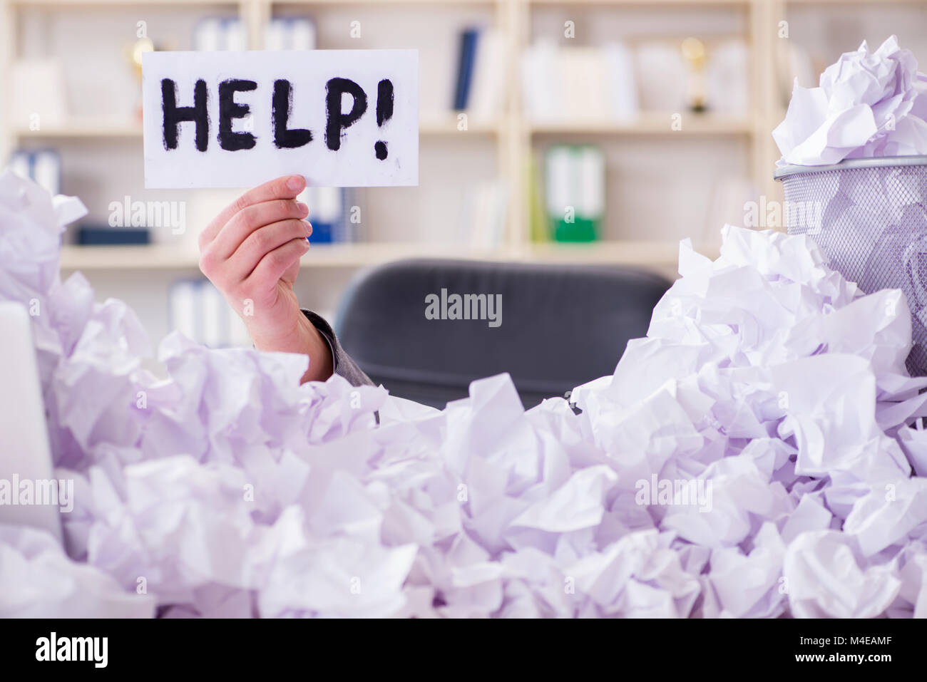 Businessman in paper recycling concept in office Stock Photo - Alamy