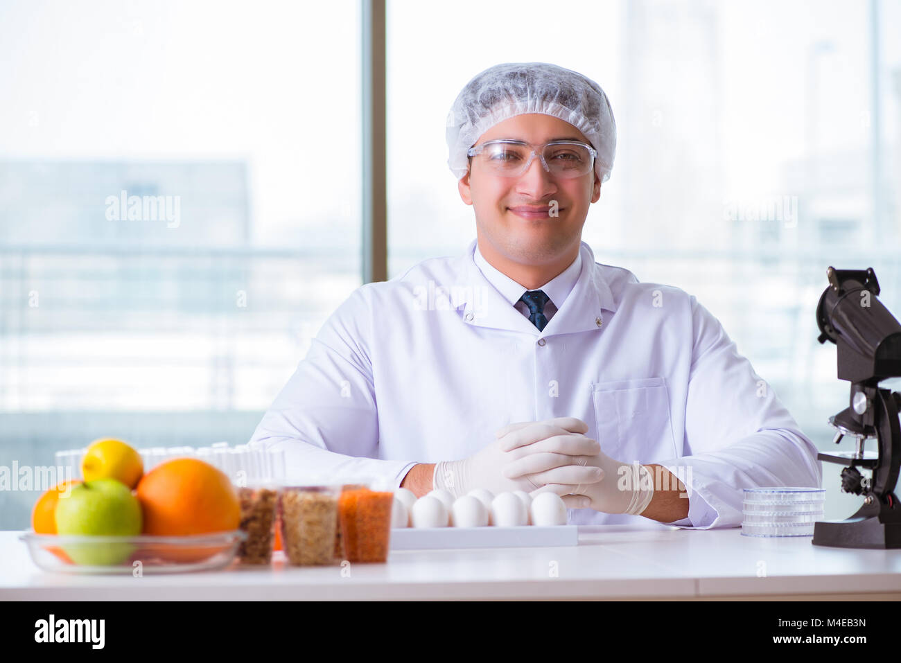Nutrition expert testing food products in lab Stock Photo - Alamy