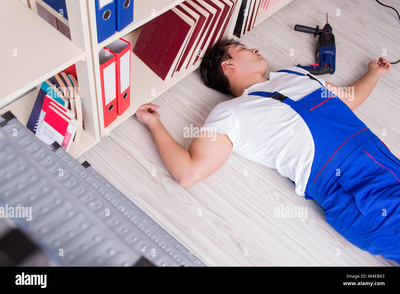 Unsafe behavior concept with falling worker Stock Photo - Alamy