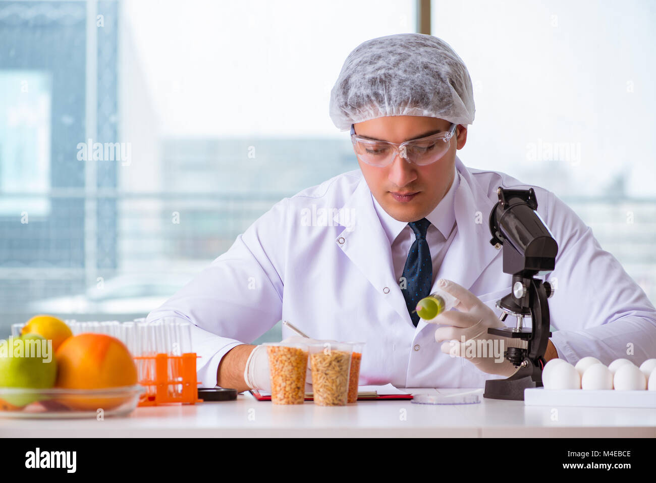 Nutrition expert testing food products in lab Stock Photo - Alamy