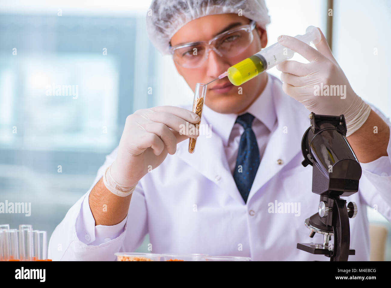 Nutrition expert testing food products in lab Stock Photo - Alamy