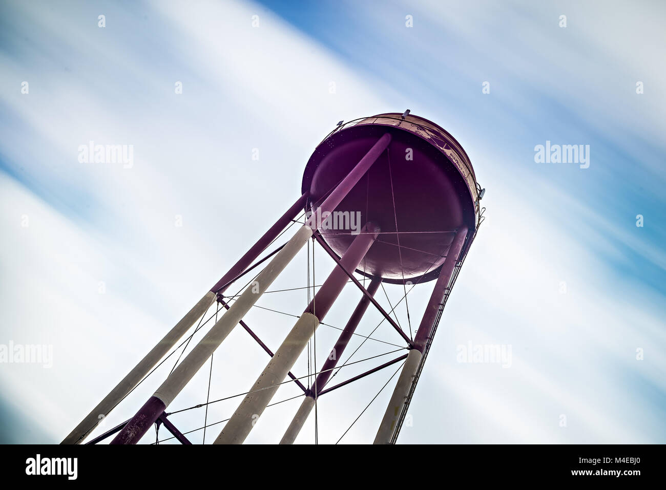 long exposure sky and clouds with water tower Stock Photo - Alamy
