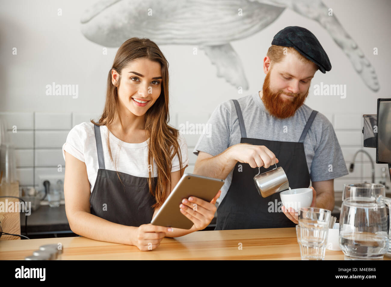Coffee Business Concept - happy young couple business owners of small ...