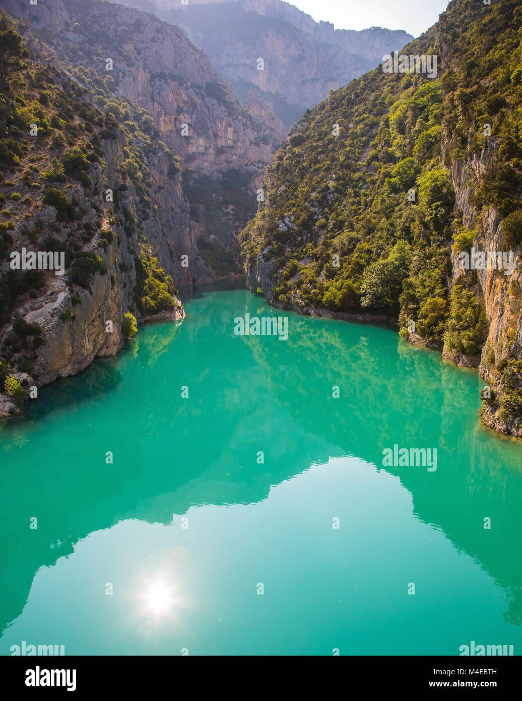Azure water reflects the clouds Stock Photo - Alamy