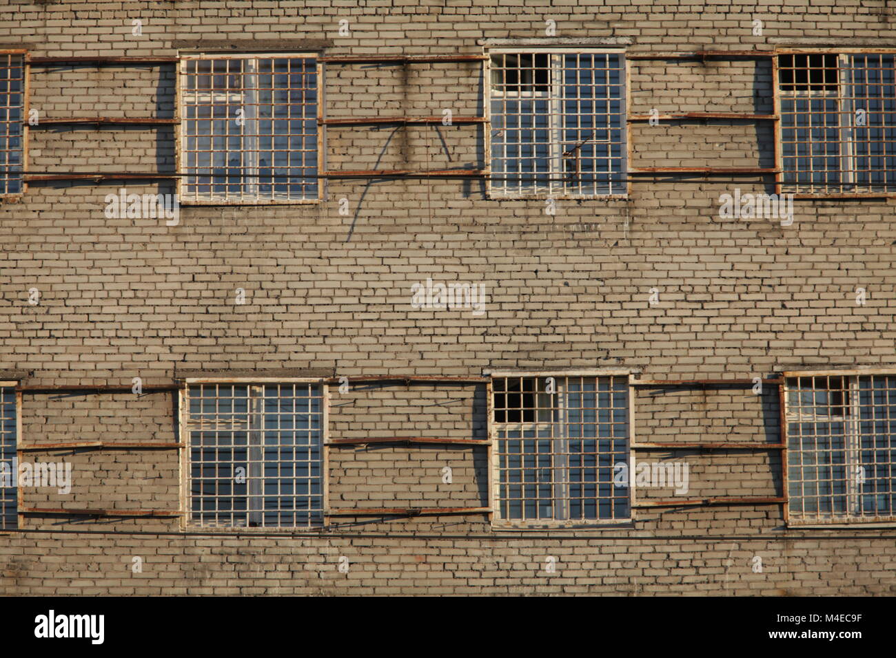 Apartments with bars on windows Stock Photo - Alamy