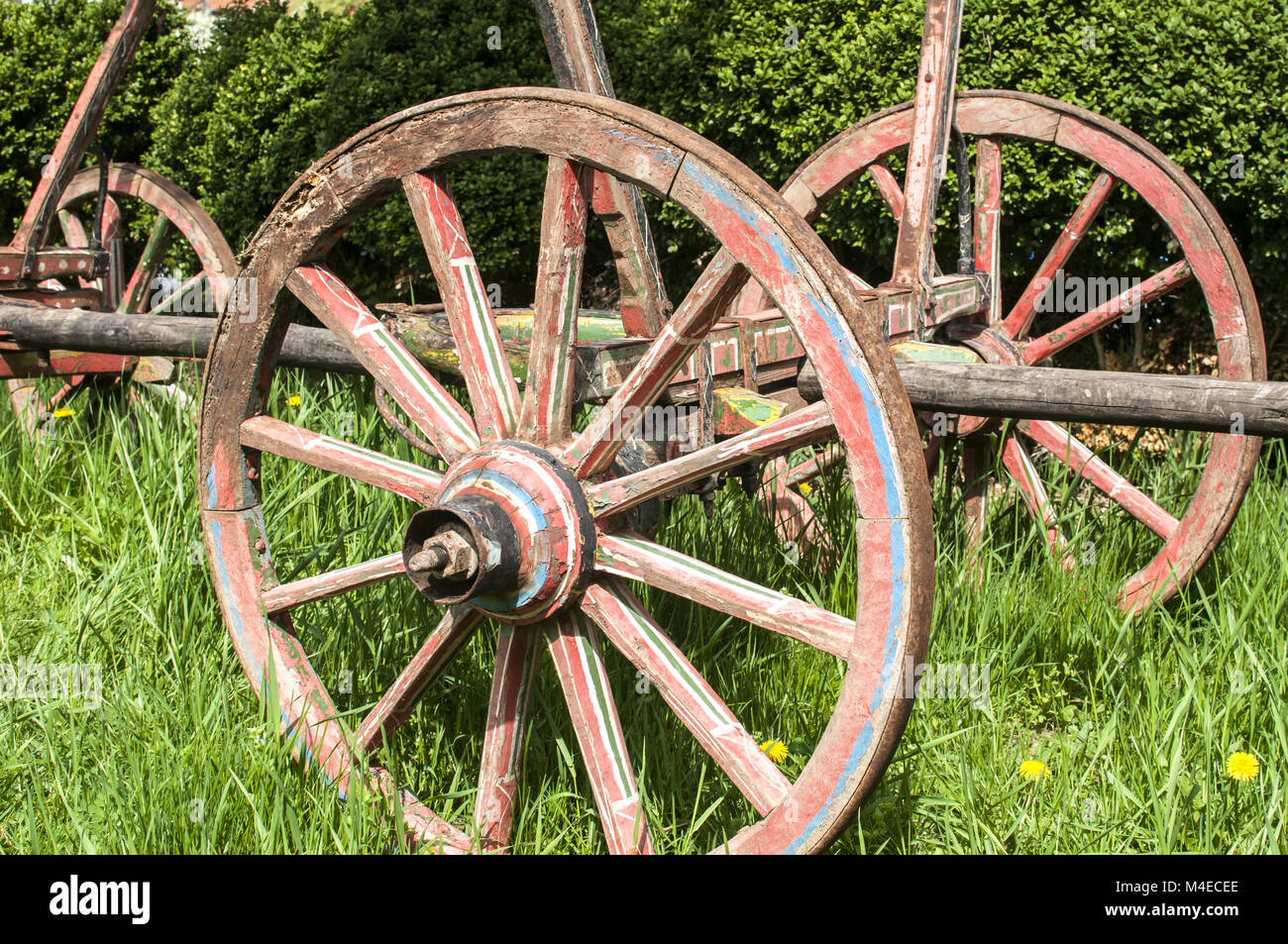 Old wooden cart wheels Stock Photo - Alamy