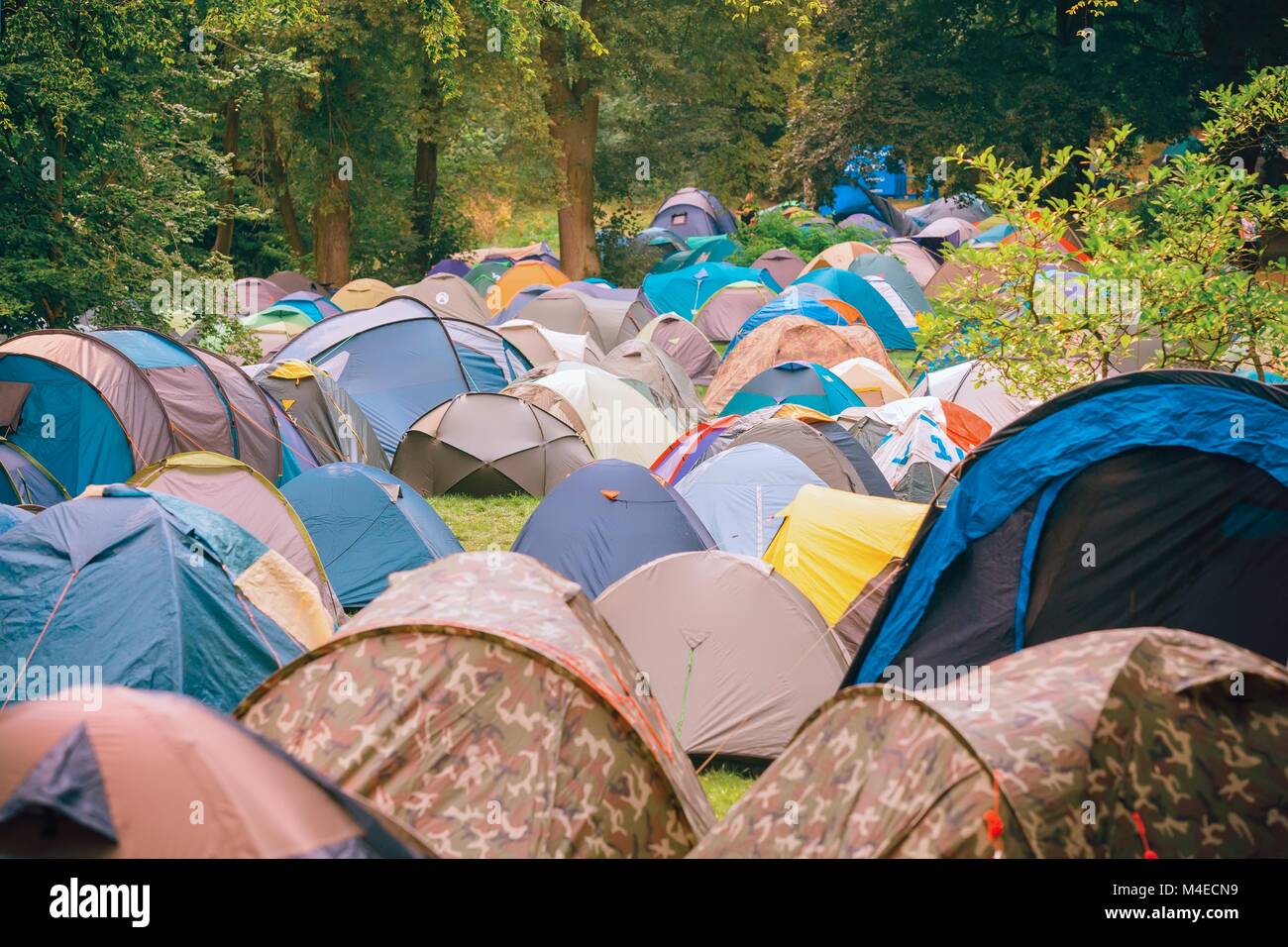 Many tents in nature Stock Photo - Alamy