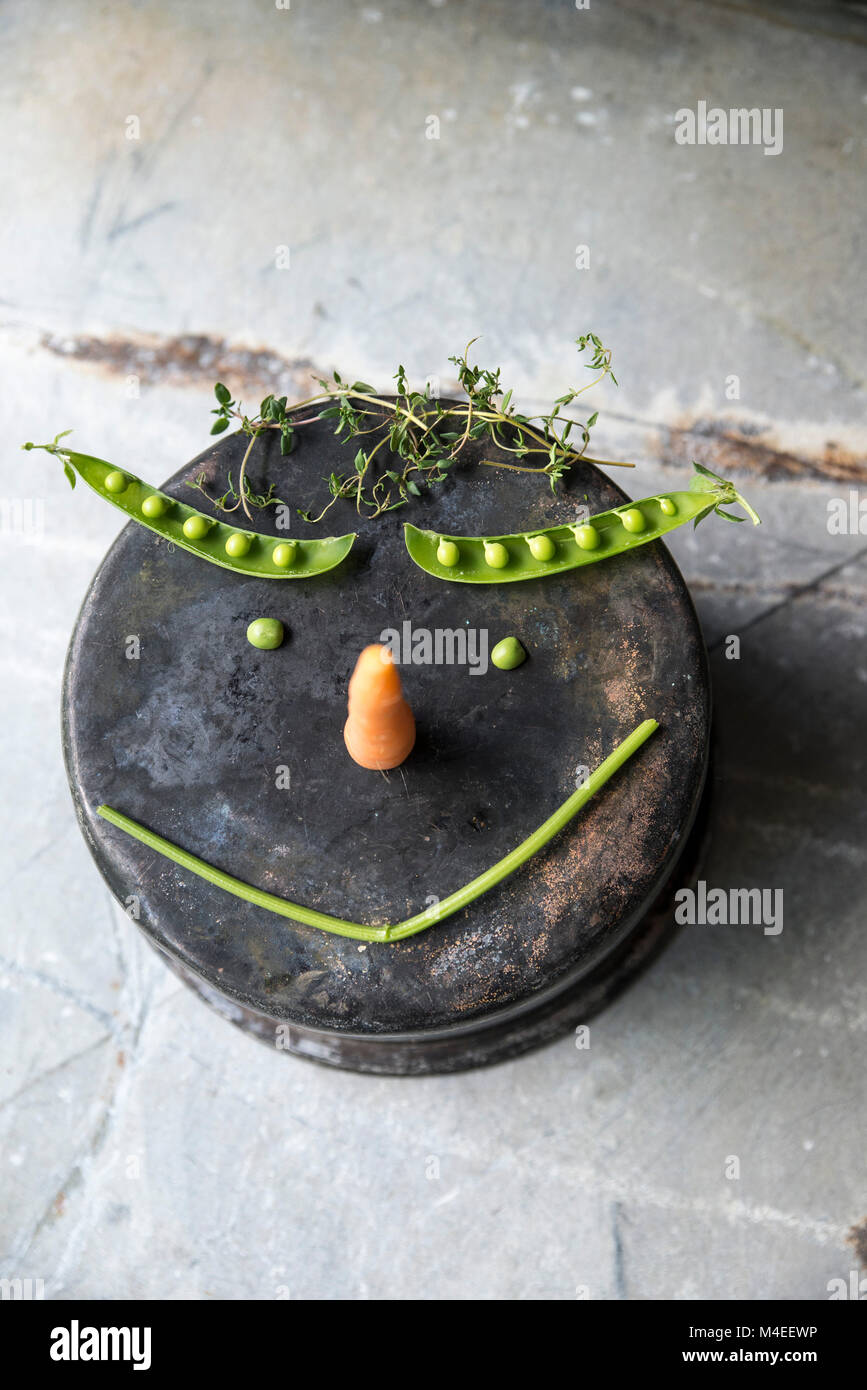 Vegetables making a smiley face Stock Photo - Alamy