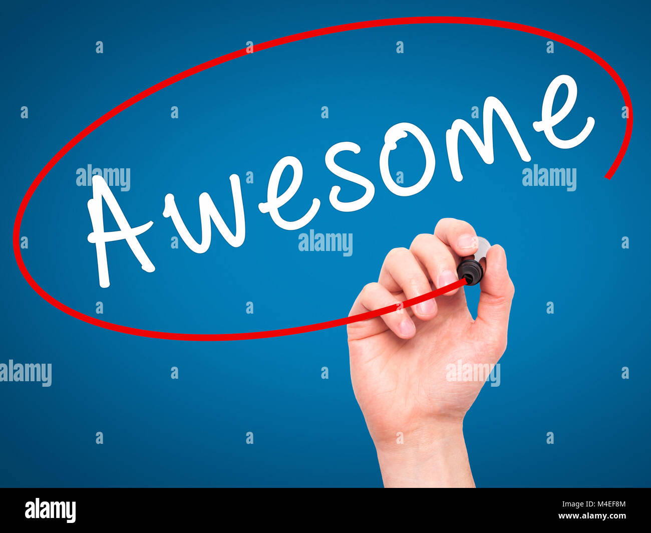 Man Hand writing Awesome with black marker on visual screen Stock Photo ...