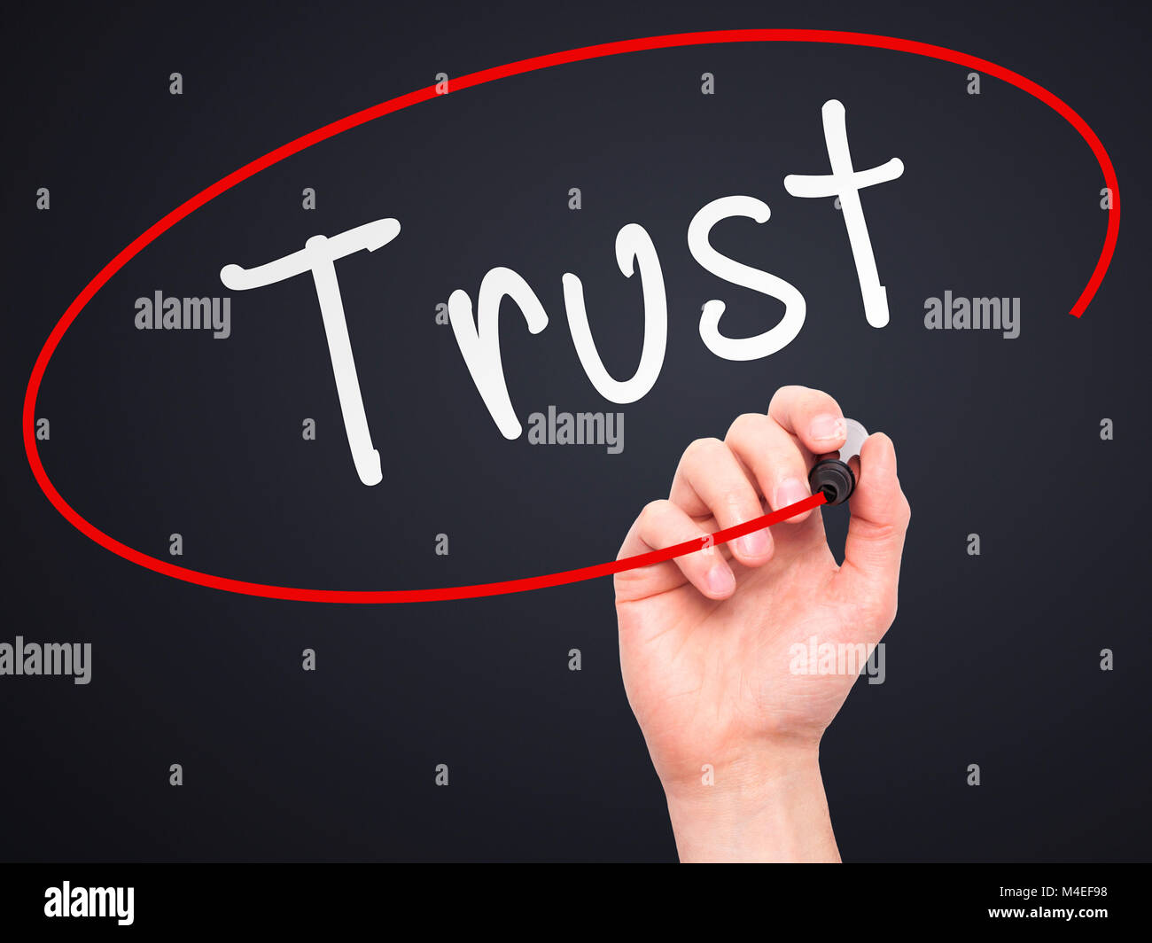 Man Hand writing Trust black marker on visual screen Stock Photo - Alamy