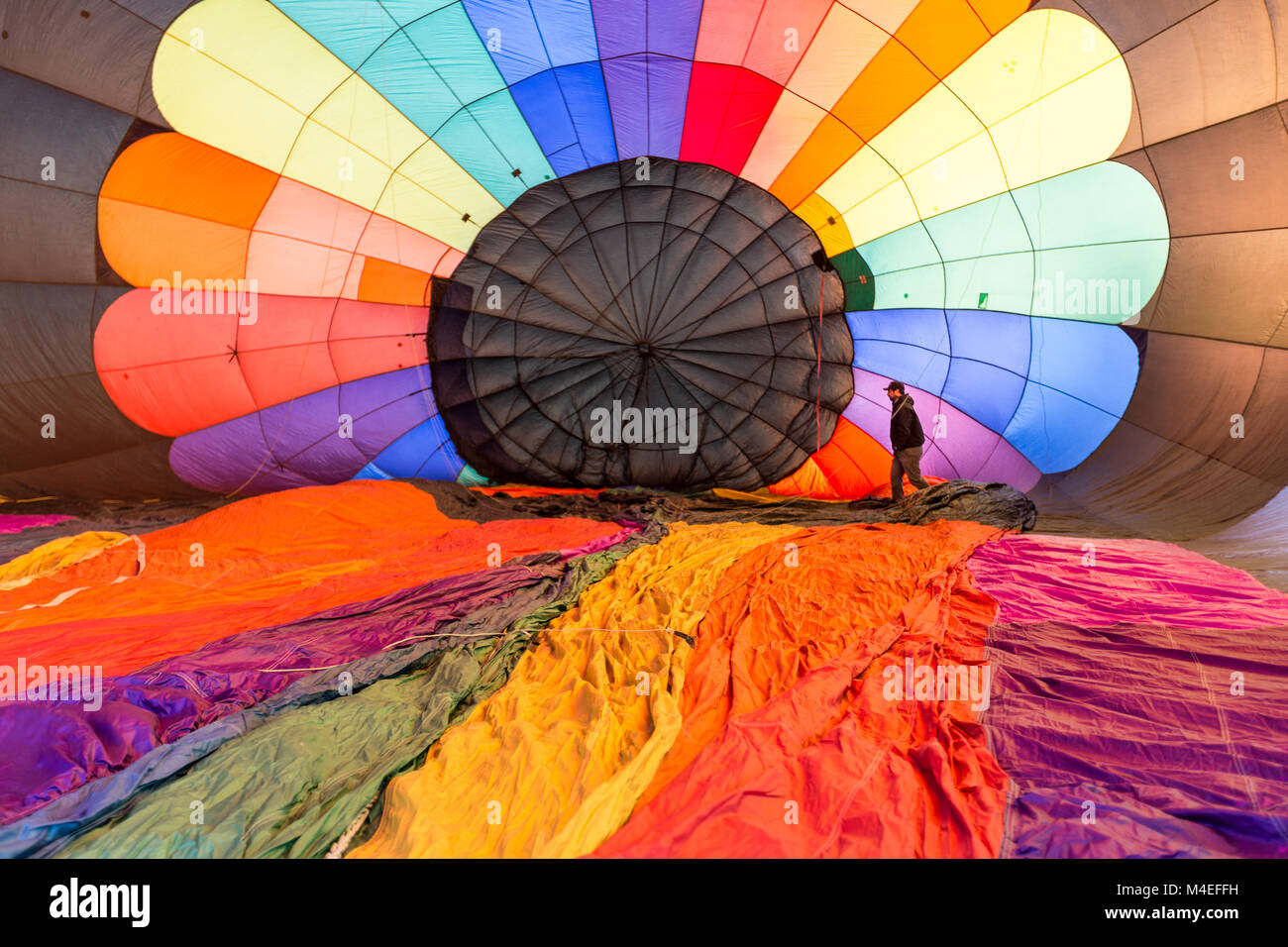 Man preparing a hot air balloon for take off Stock Photo - Alamy