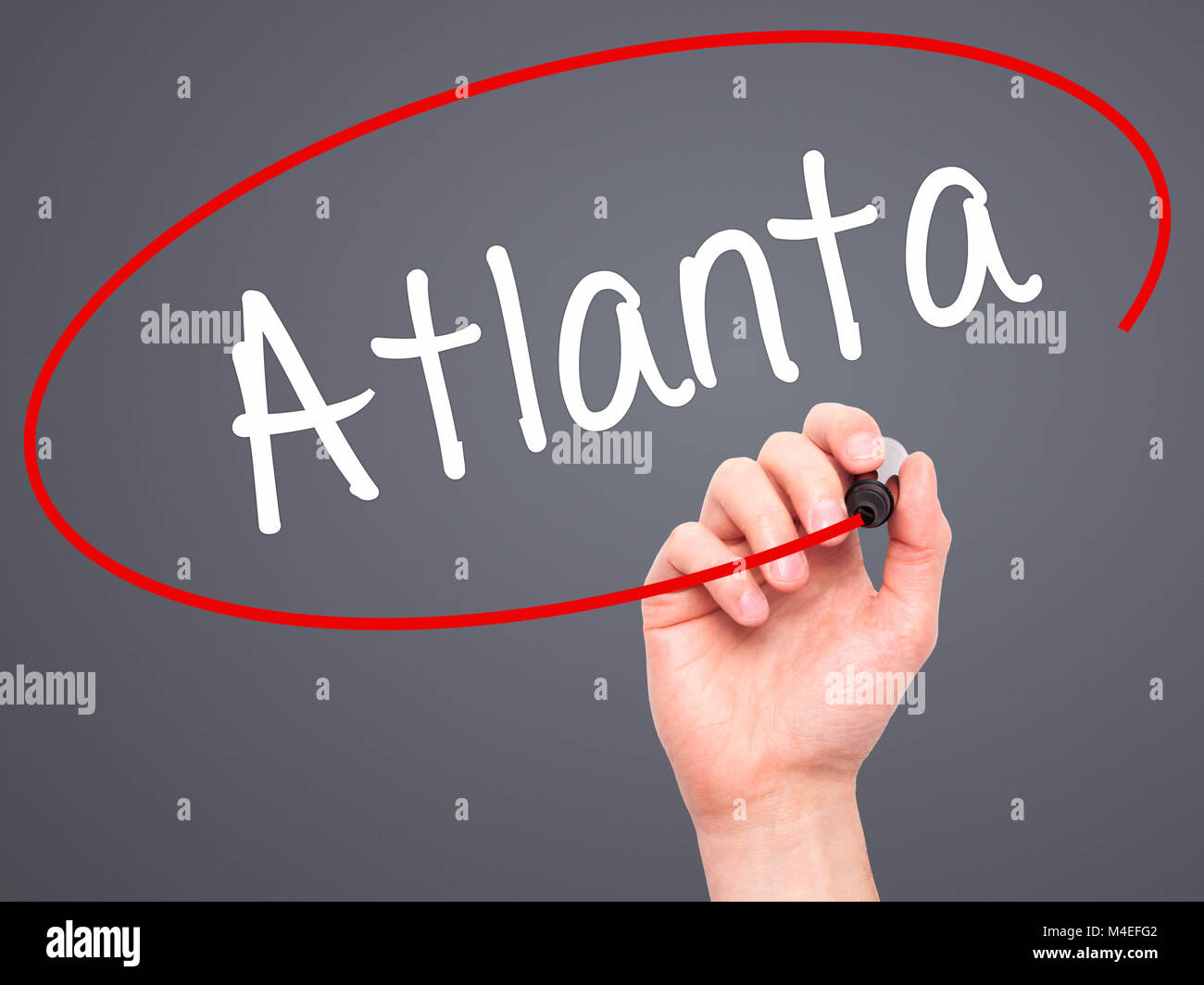 Man Hand writing Atlanta with black marker on visual screen Stock Photo ...