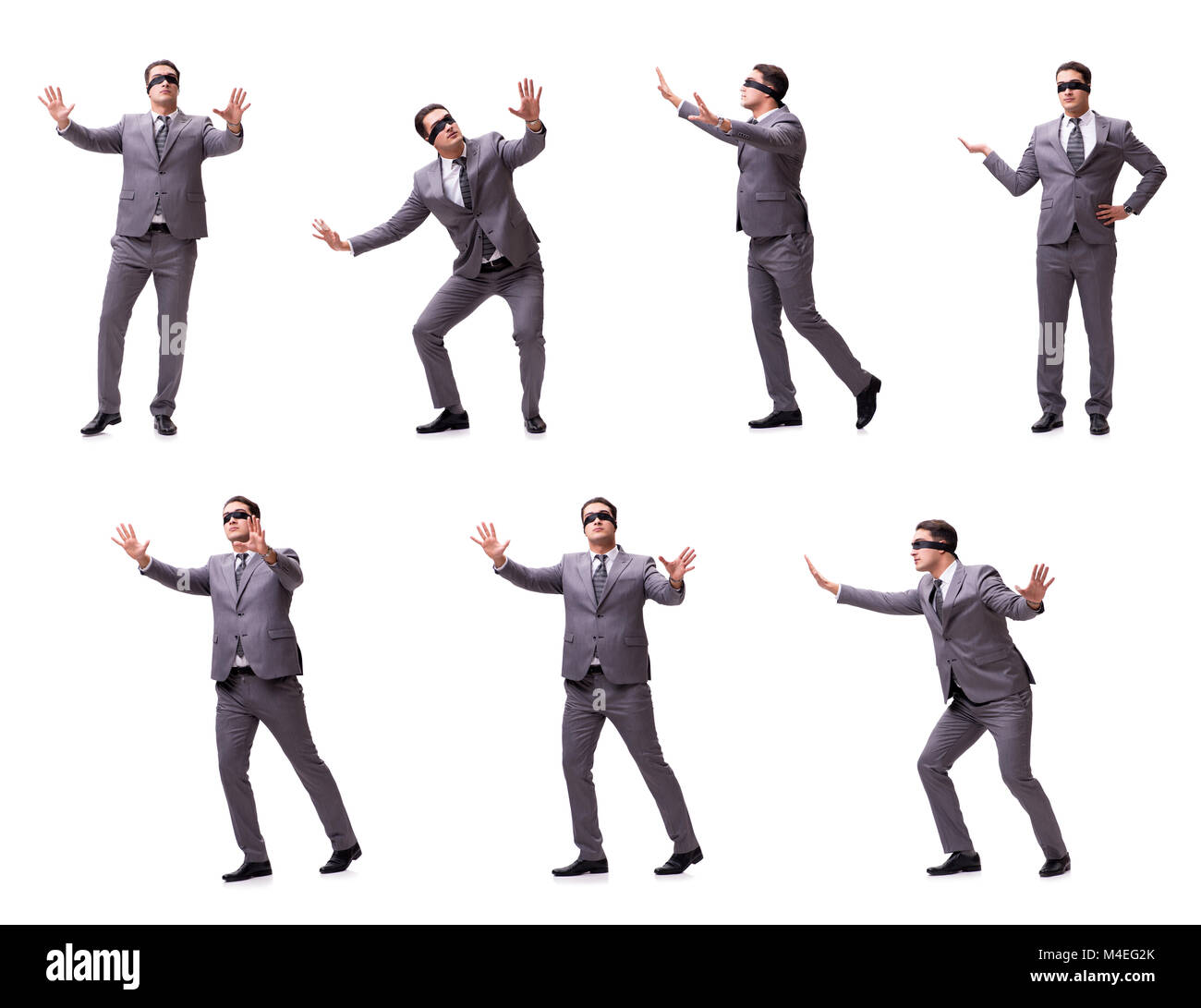 The blindfolded businessman isolated on white Stock Photo - Alamy