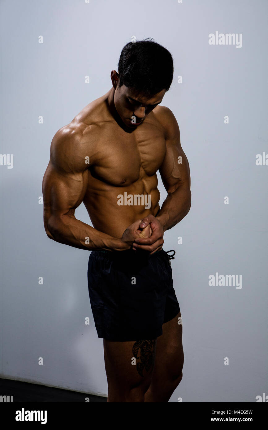 A fitness model torso with the chest muscles tightly flexed. Medium ...