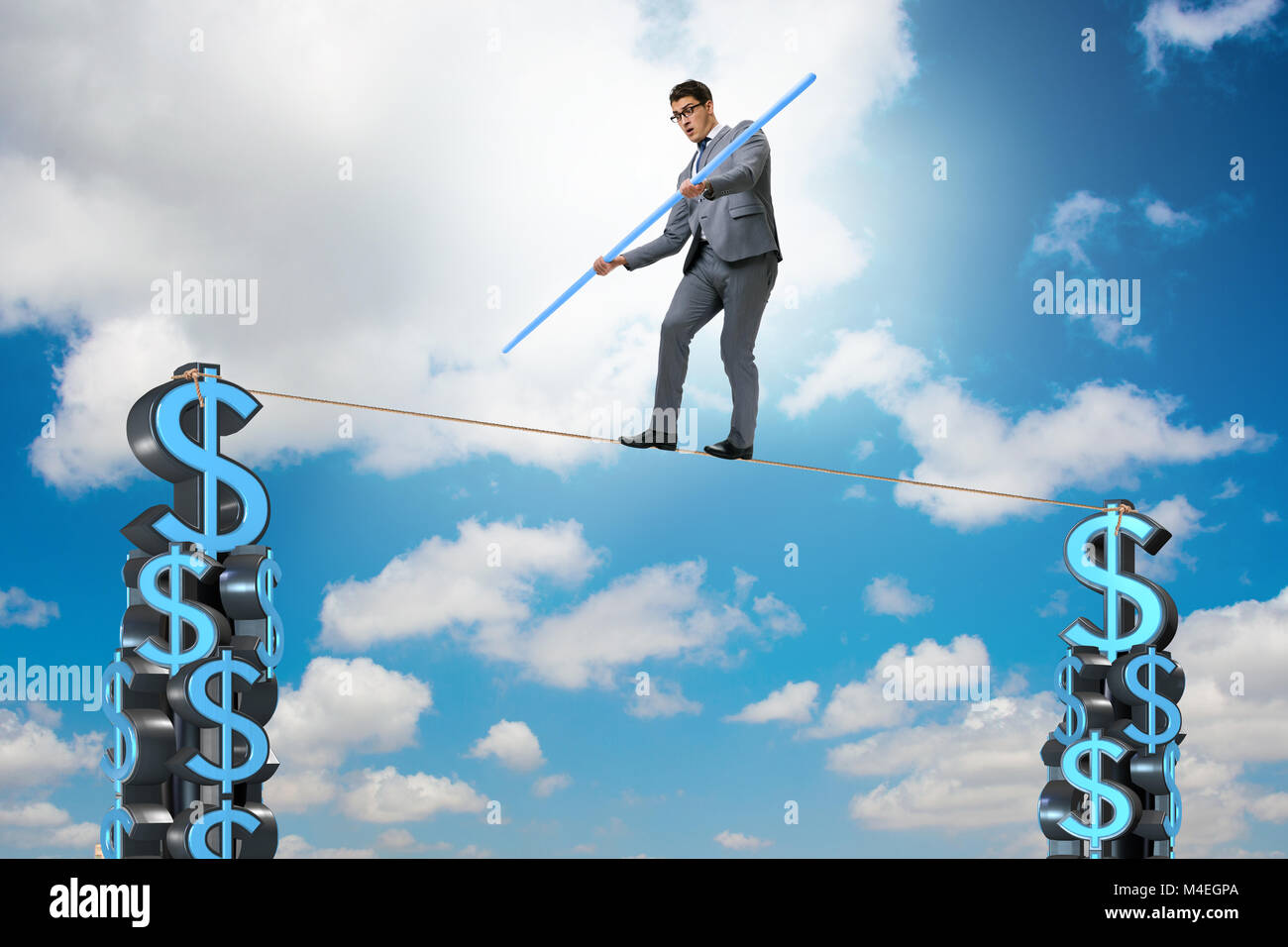Businessman walking on tight rope Stock Photo - Alamy