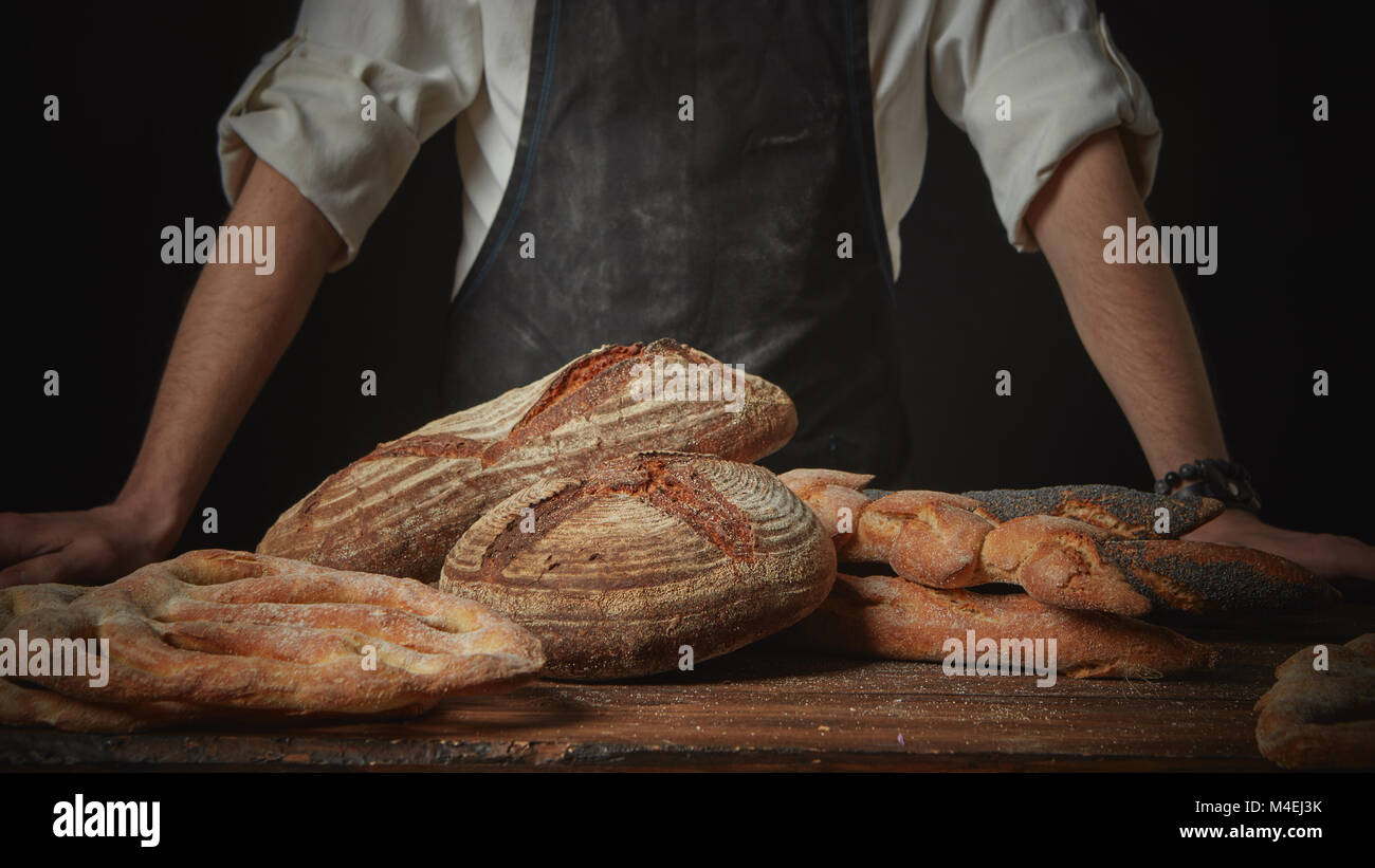 Table with fresh bread hi-res stock photography and images - Alamy