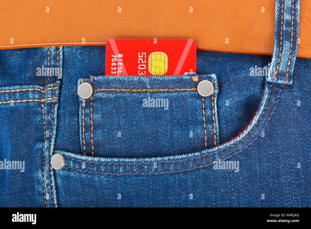 Credit card in jeans pocket Stock Photo - Alamy