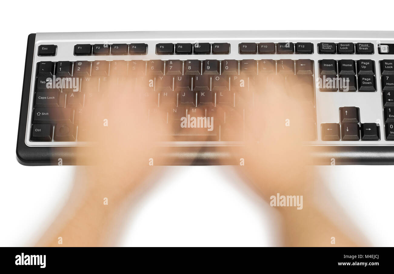 Computer keyboard and motion blur hands Stock Photo - Alamy