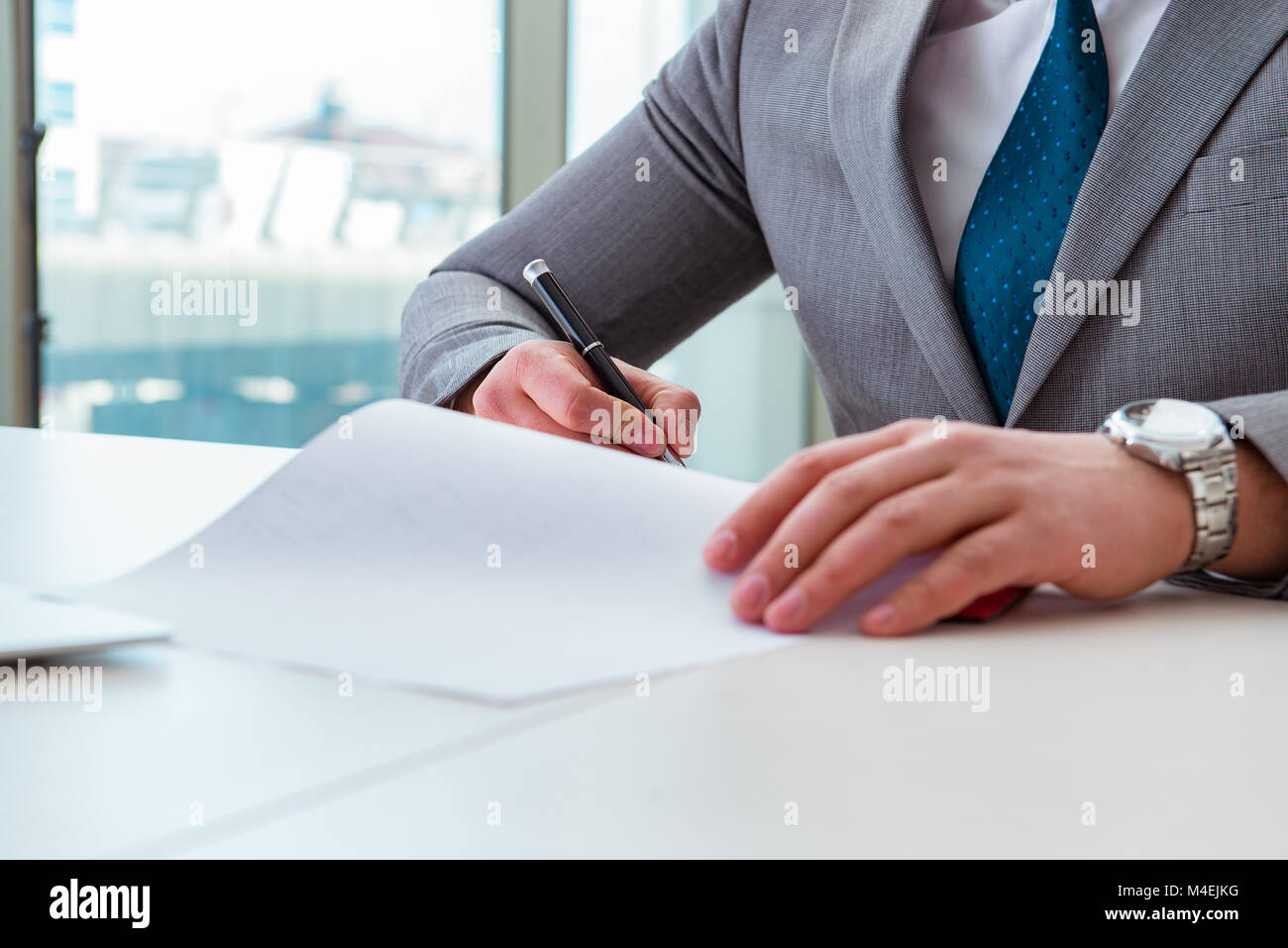 Businessman taking notes at the meeting Stock Photo - Alamy