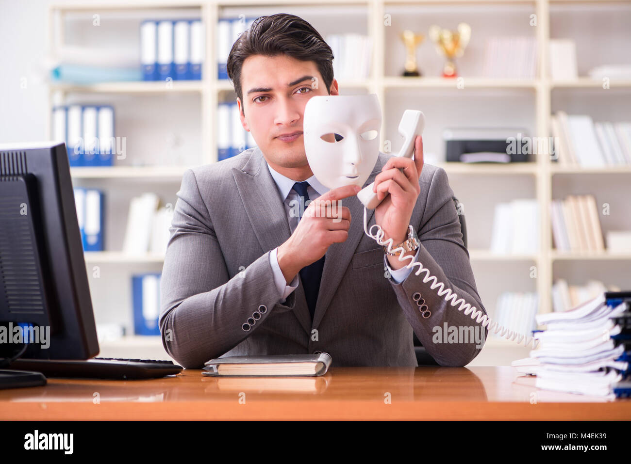 Anonymous businessman talking on phone hi-res stock photography and ...
