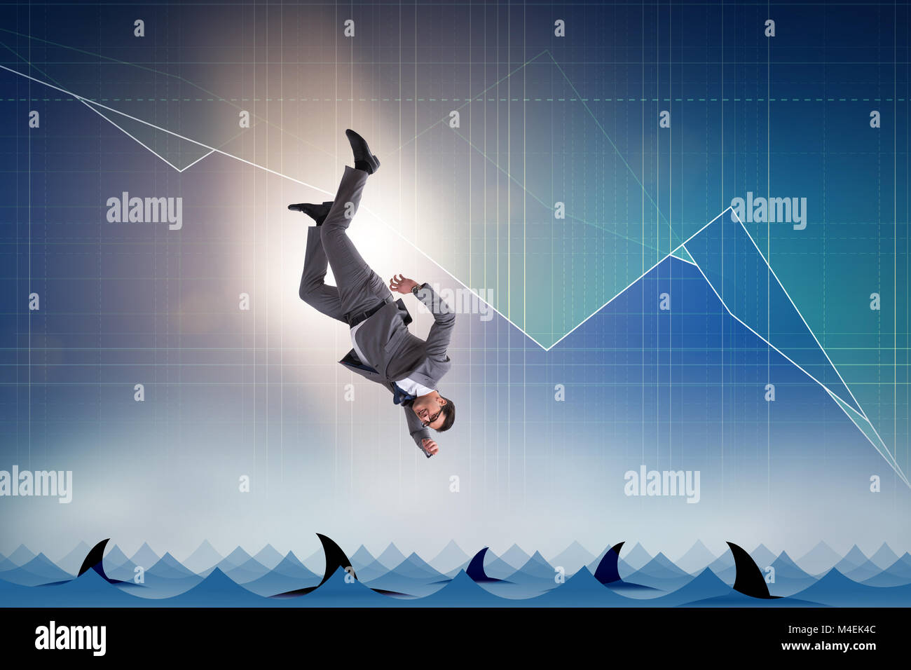Businessman falling into sea with sharks Stock Photo - Alamy