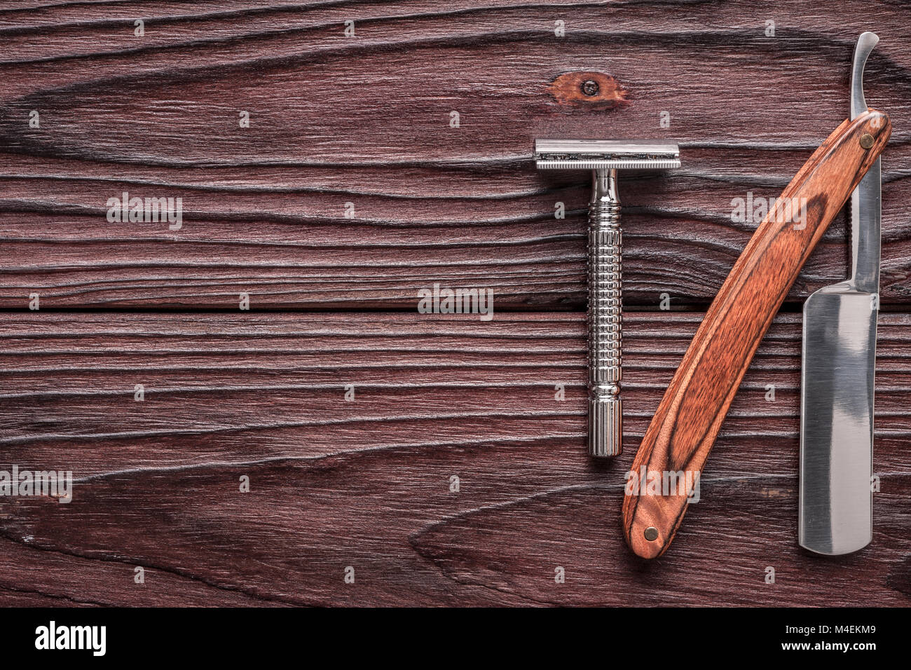 Vintage barber shop razor tools on wooden background Stock Photo - Alamy