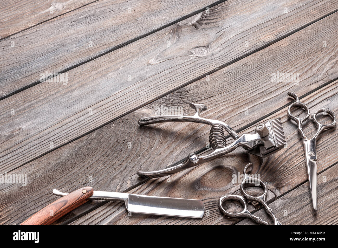 Vintage barber shop tools on wooden background Stock Photo - Alamy