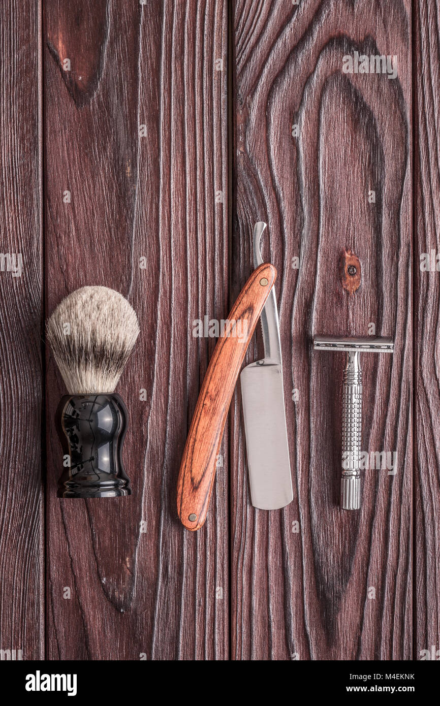 Vintage barber shop tools on wooden background Stock Photo - Alamy