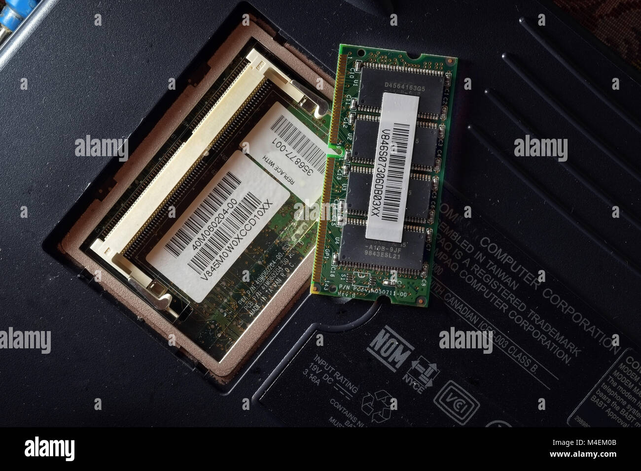 Laptop computer memory upgrade port and memory chip card Stock Photo ...