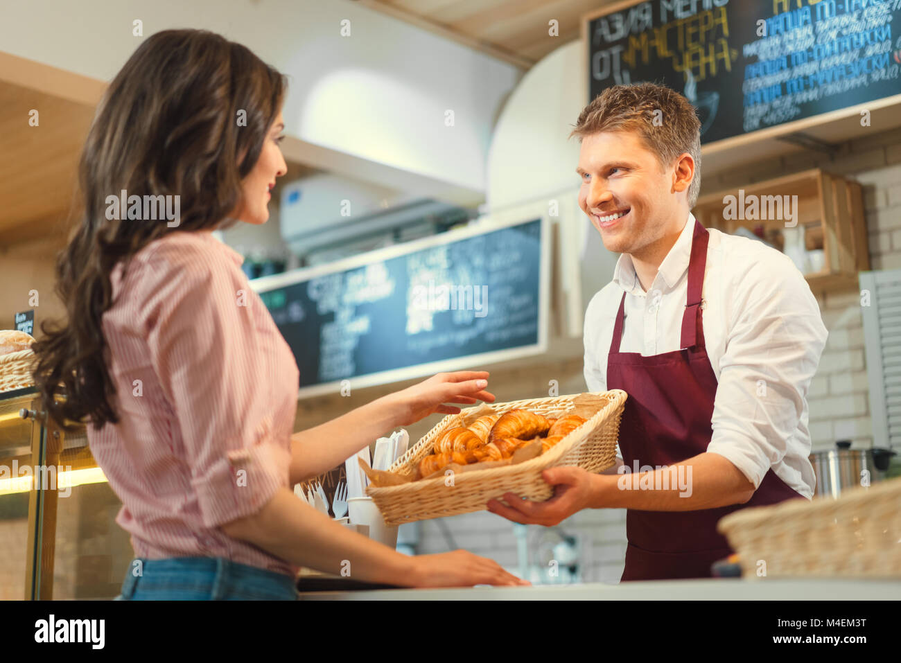 At the counter Stock Photo - Alamy