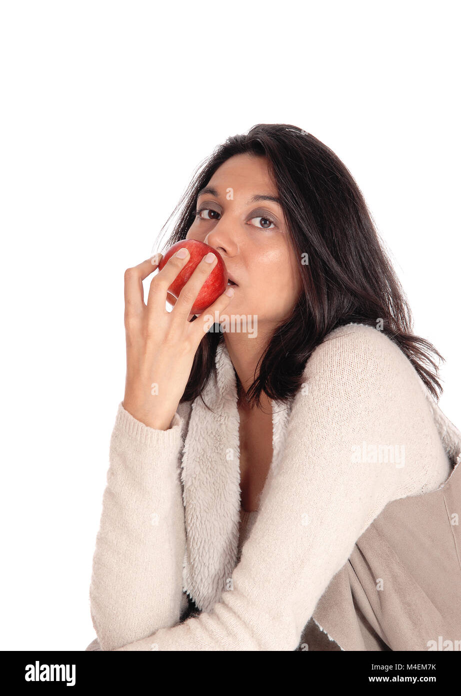 Woman eating red apple Stock Photo - Alamy
