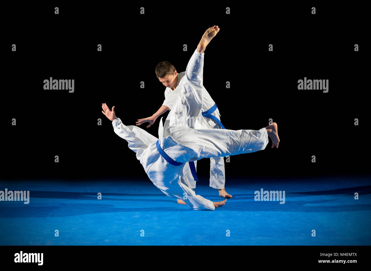 Two boys martial arts fighters isolated Stock Photo - Alamy