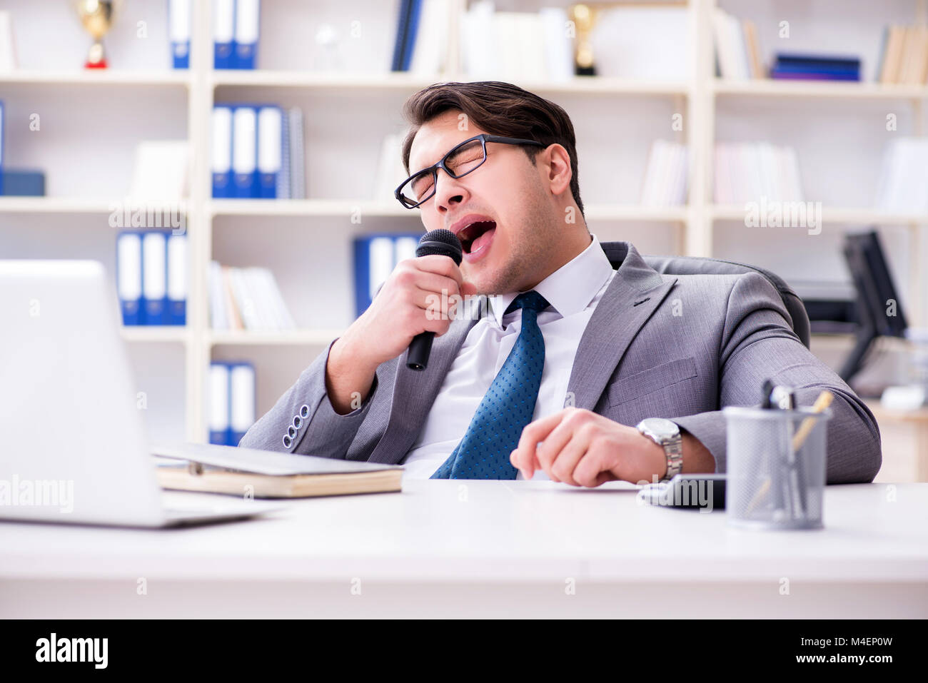 Businessman desk sitting noteboo hi-res stock photography and images ...